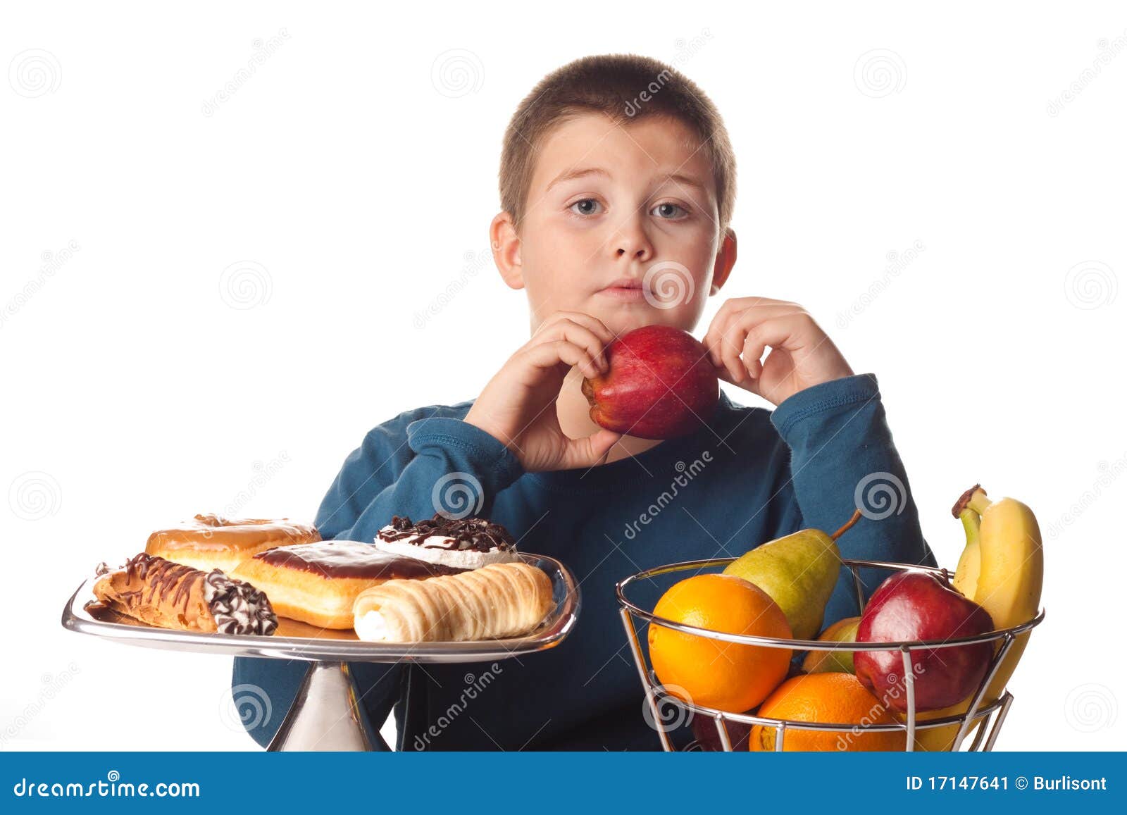 Boy Choosing a Healthy Apple Stock Image - Image of donuts, concept ...