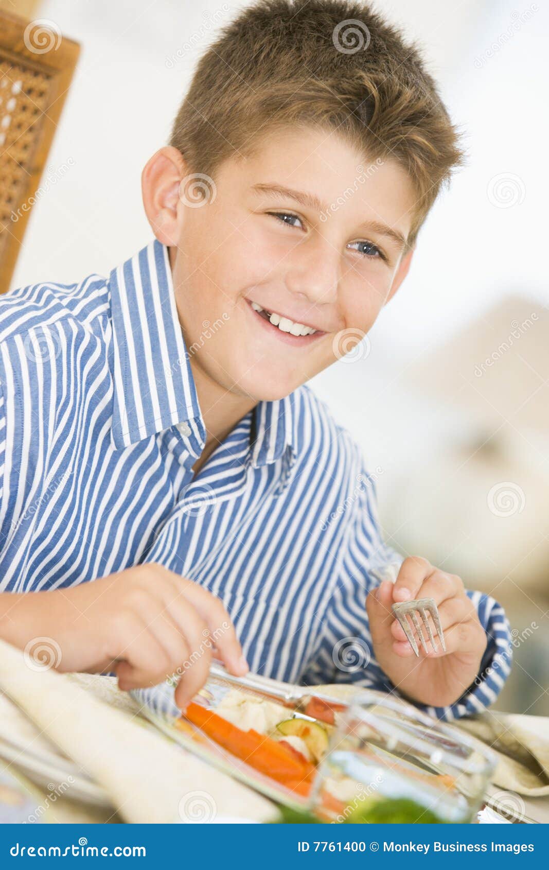 Boy at Christmas Dinner stock photo. Image of celebrating - 7761400