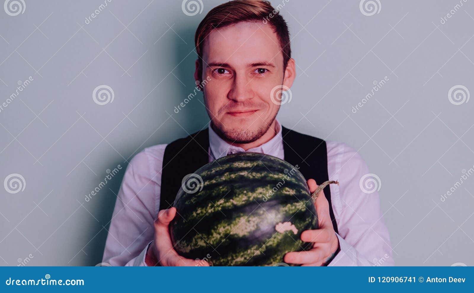 A Man and a Watermelon / Boy in Classic Suit with a Watermelon Stock ...