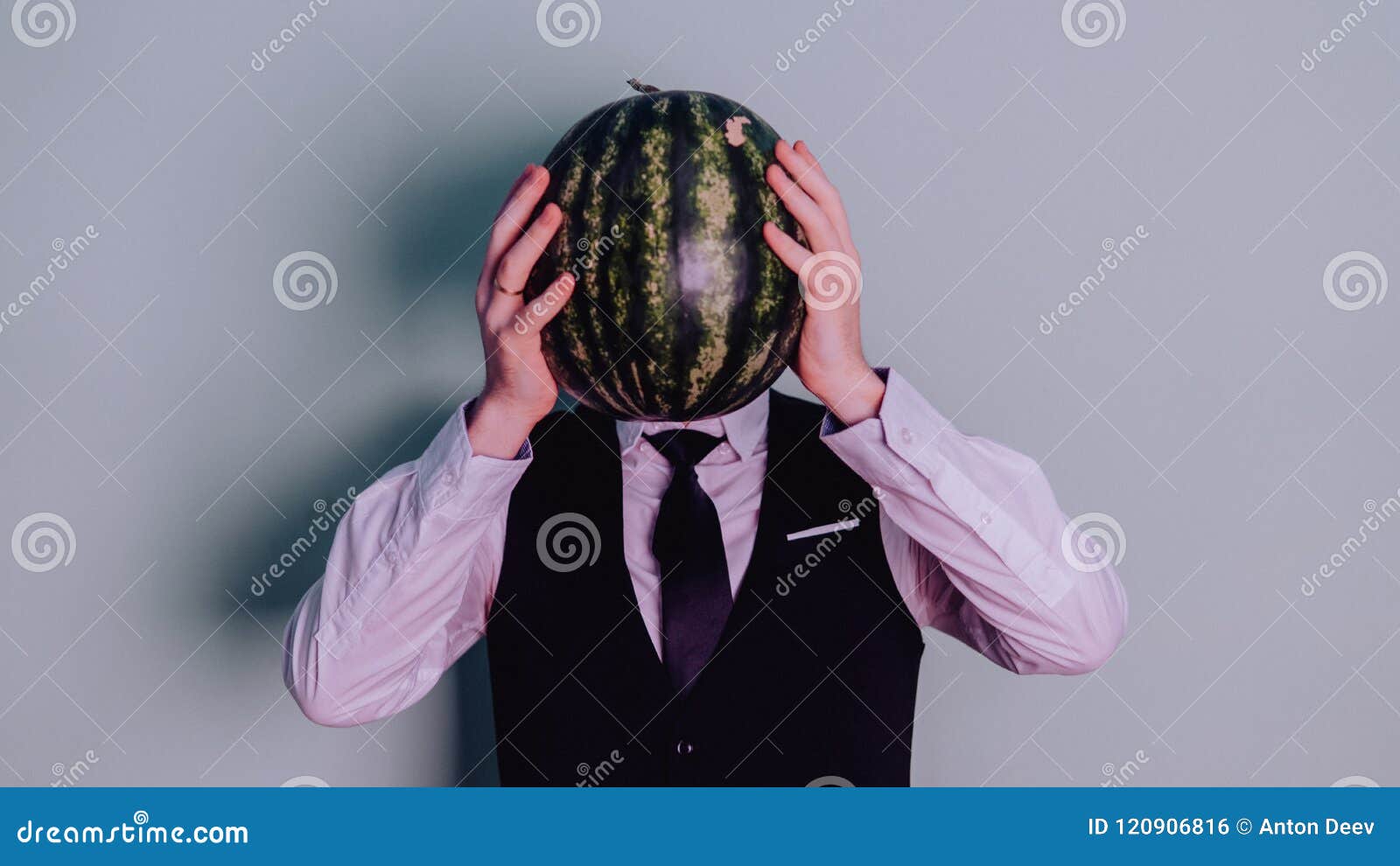 A Man and a Watermelon / Boy in Classic Suit with a Watermelon Stock ...