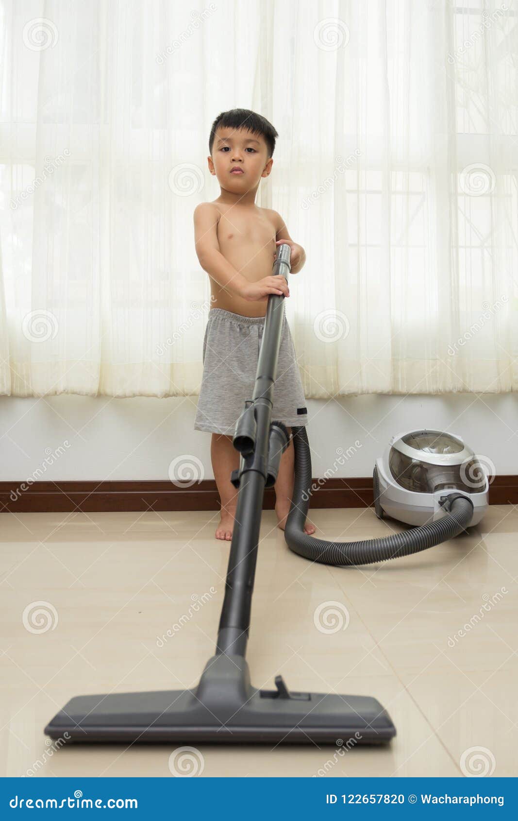 The Boy is Cleaning the Floor Stock Photo - Image of caucasian, help ...