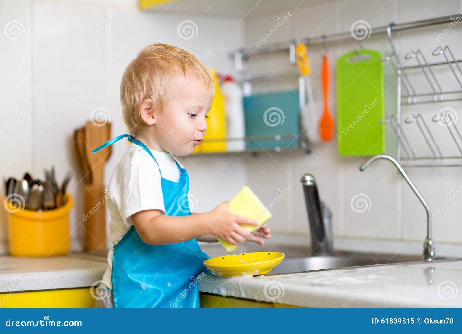 Boy Cleaning the Kitchen after Making Dinner Stock Image - Image of ...