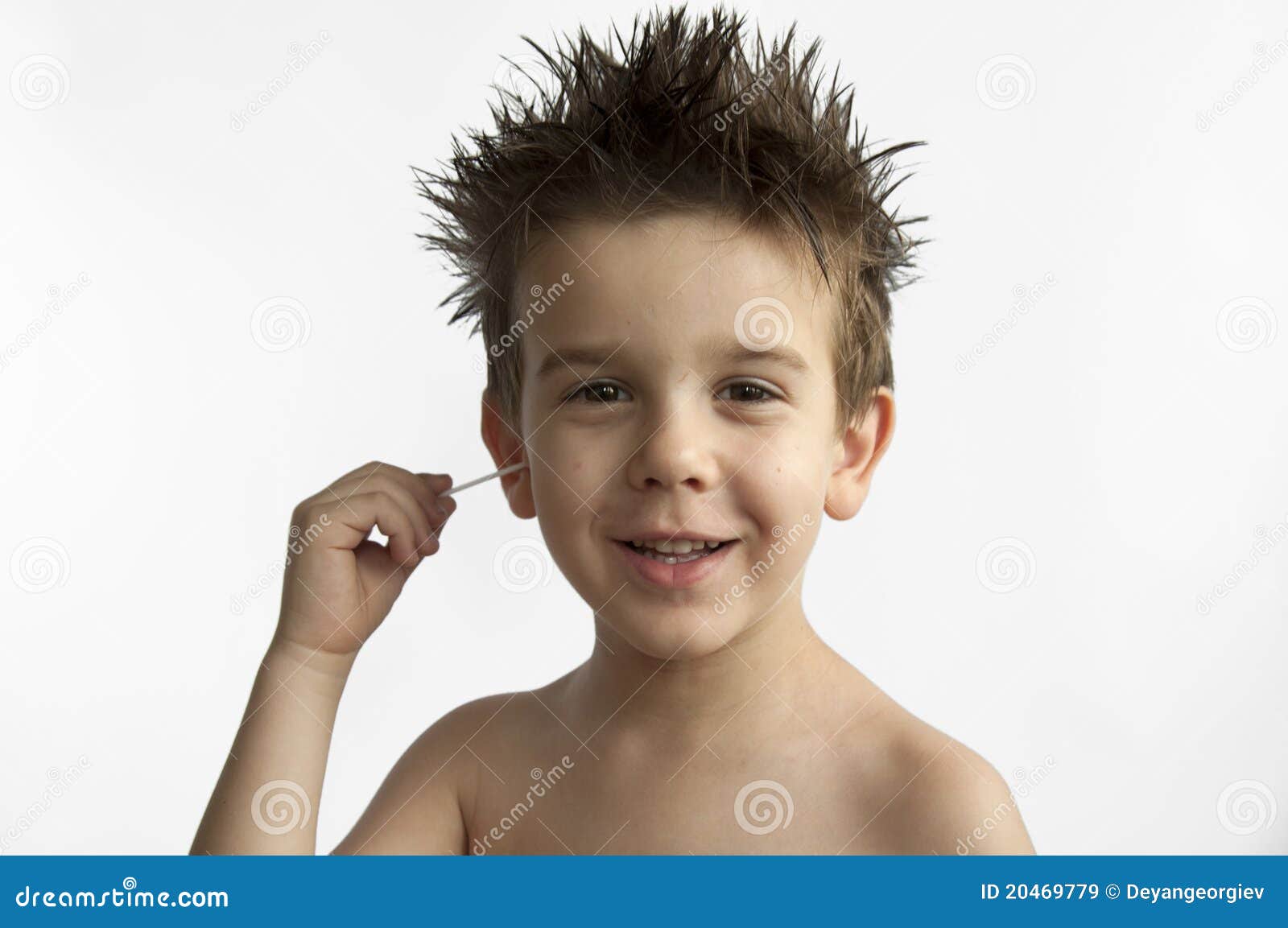 Boy cleans his ear stock image. Image of gratification - 20469779