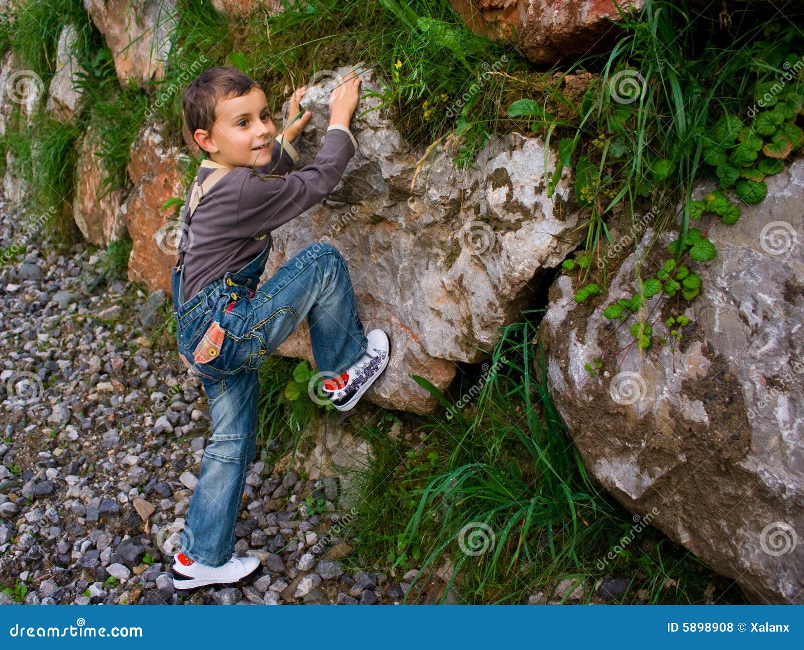 Boy climbing stock photo. Image of cliff, achievement - 5898908