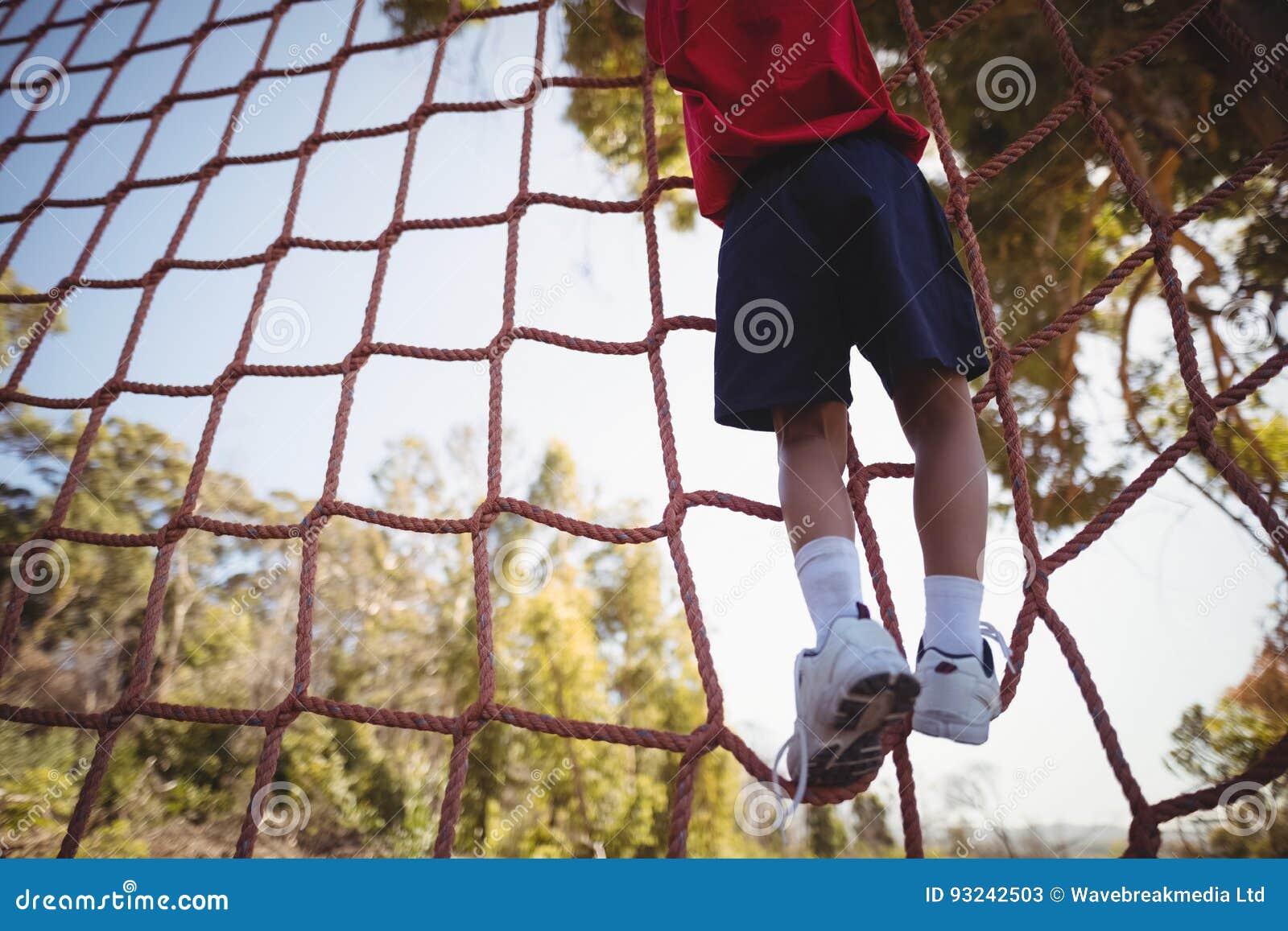 Boy Climbing a Net during Obstacle Course Stock Image - Image of climb ...