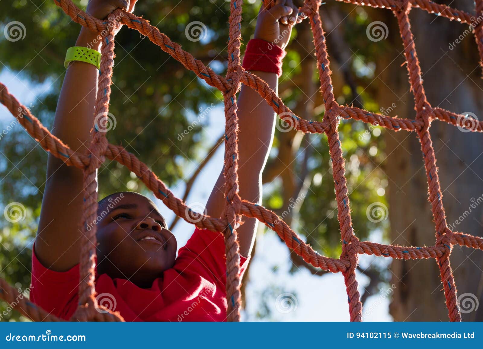 Boy Climbing a Net during Obstacle Course Training Stock Image - Image ...