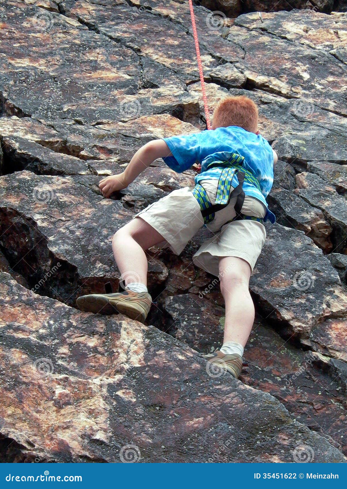 Boy climbing on rope stock photo. Image of expression - 35451622