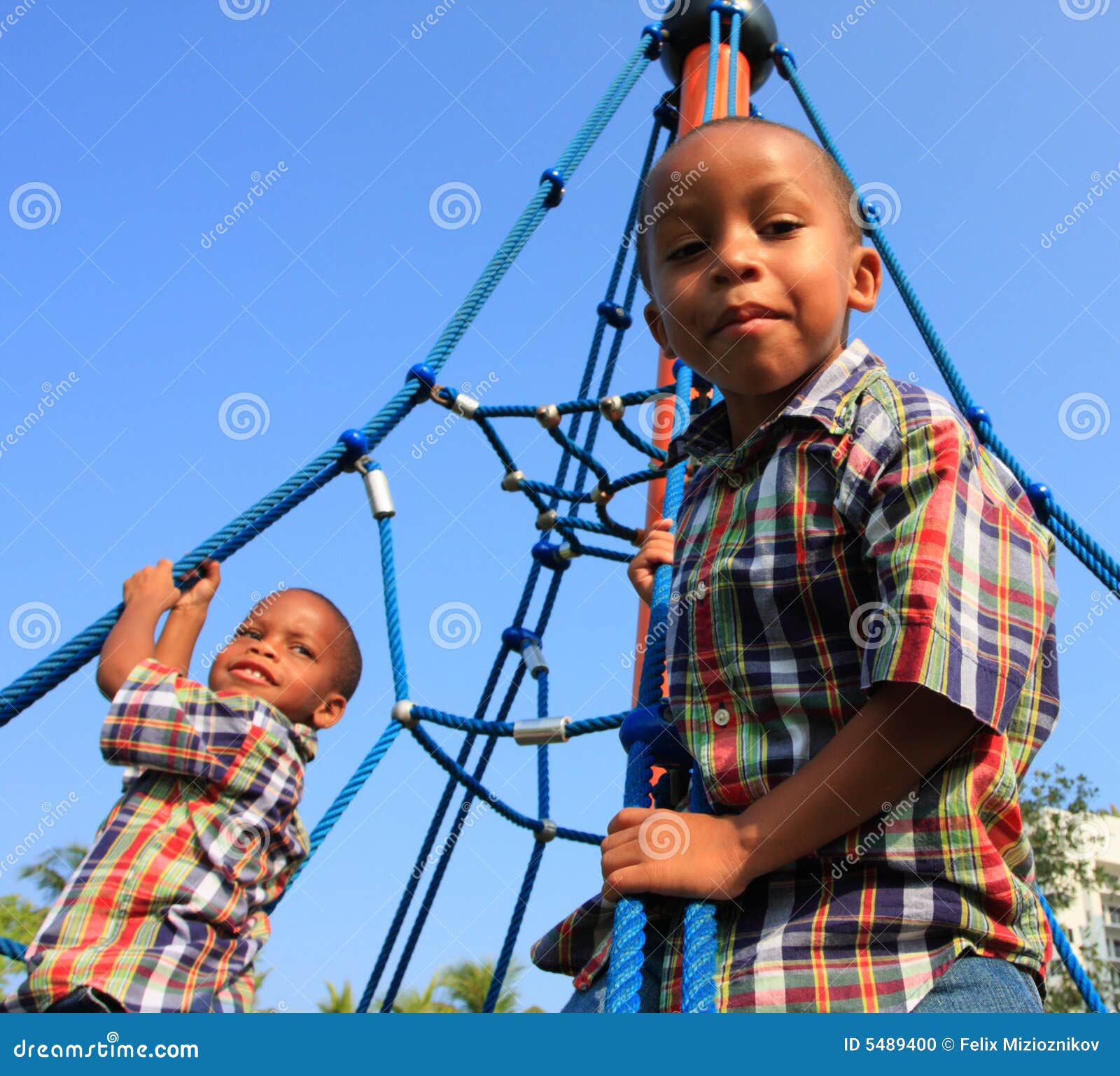 Boy Climbing Ropes stock photo. Image of climbing, playground - 5489400