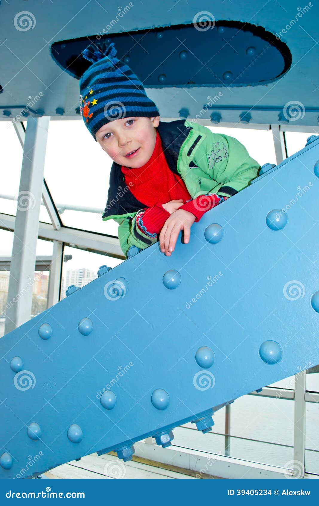 Boy climbs on the bridge stock photo. Image of steel - 39405234