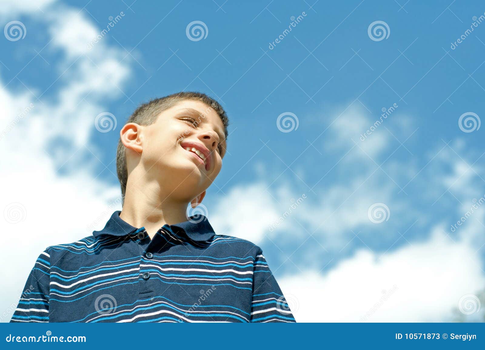 Boy at the clouds stock image. Image of life, lifestyle - 10571873