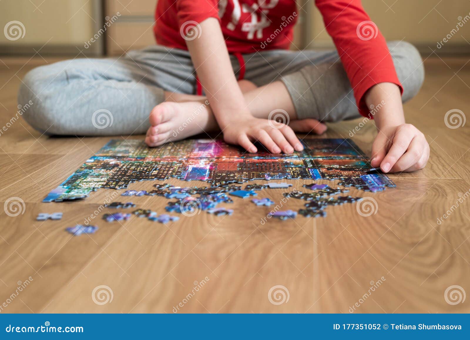 Boy Collect Puzzle Sitting on the Floor. Solving Difficult Tasks or ...