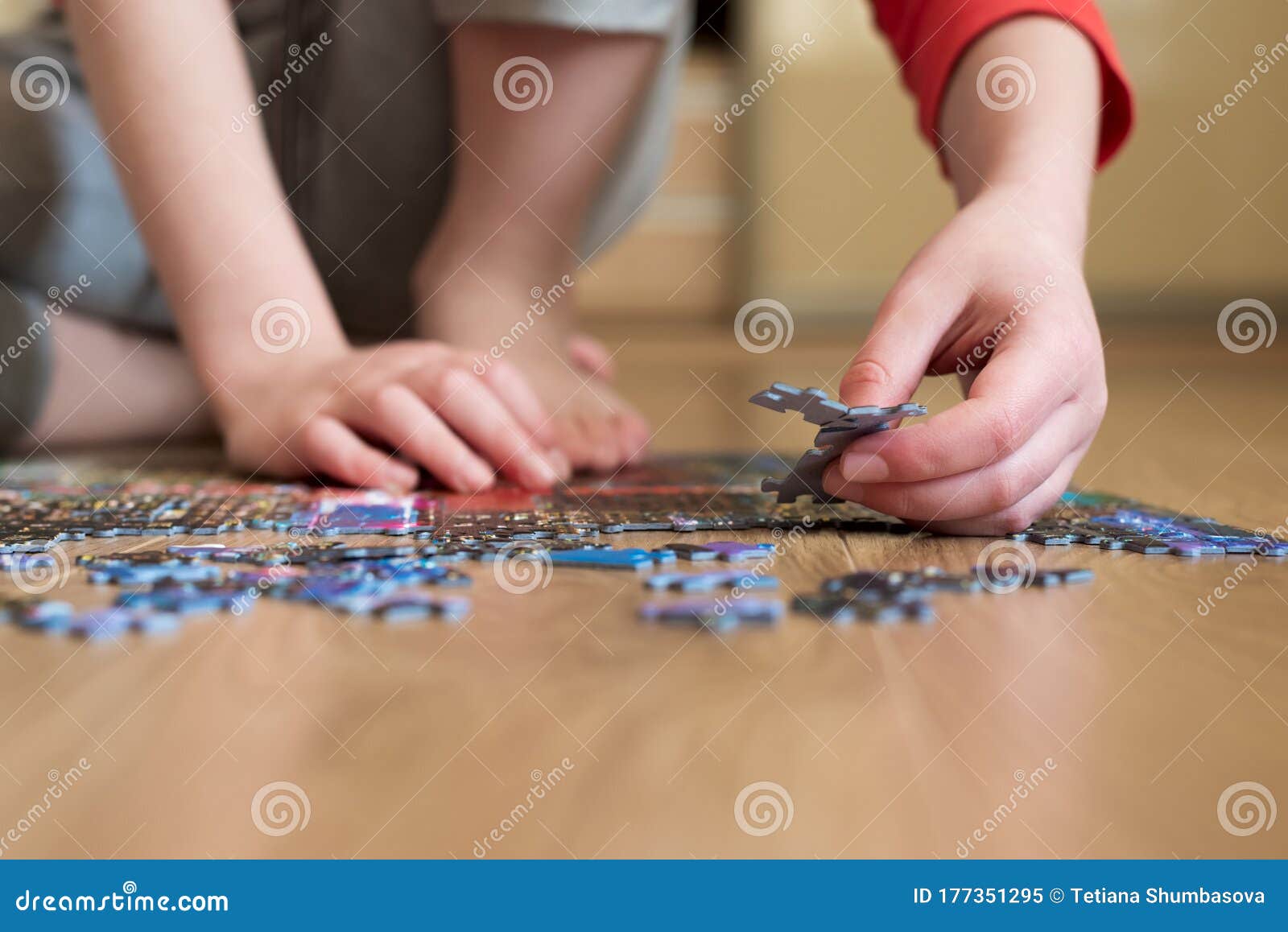 Boy Collect Puzzle Sitting on the Floor. Solving Difficult Tasks or ...