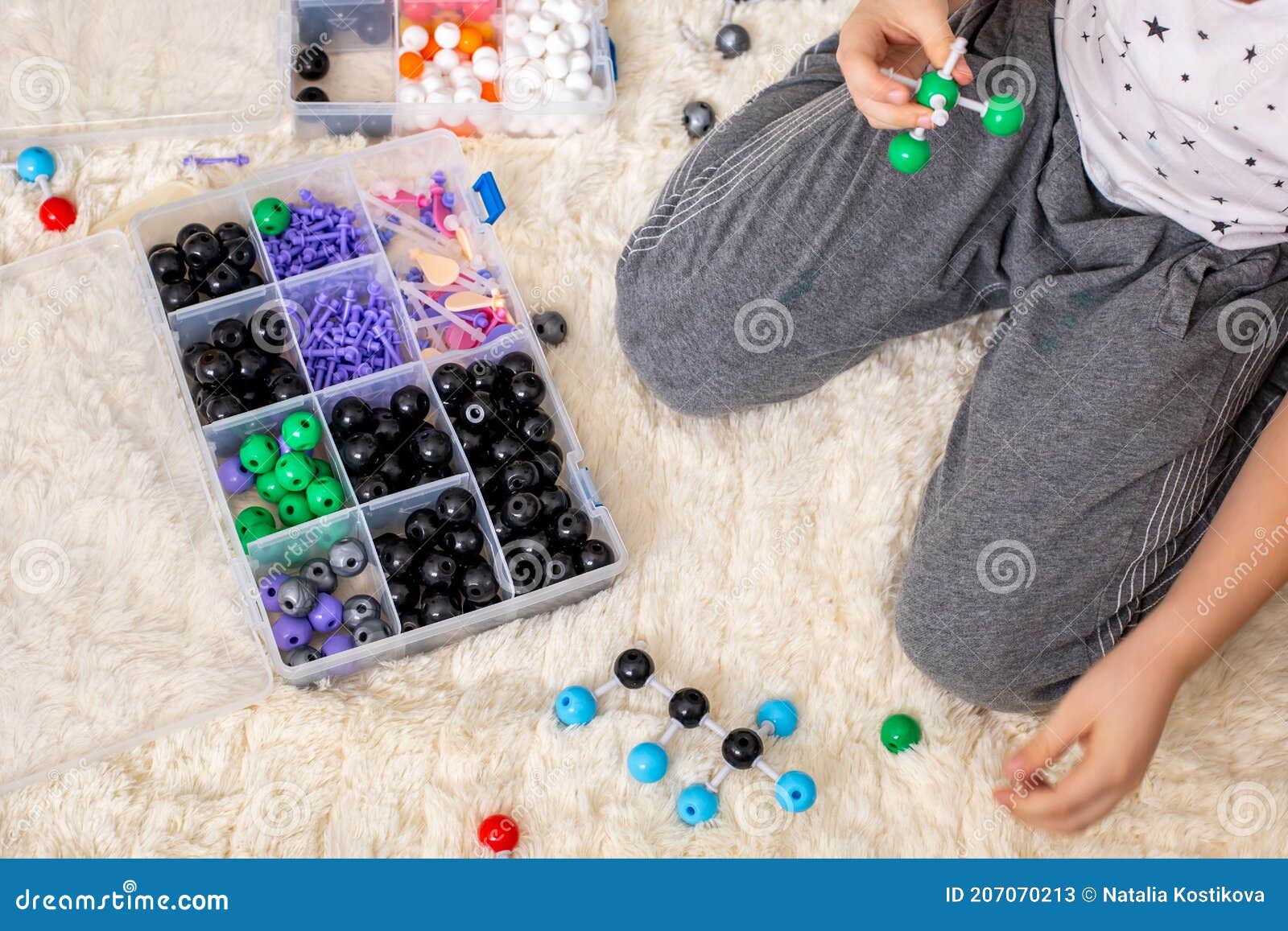 The Boy Collects from the Constructor a Model of an Emerald Molecule ...