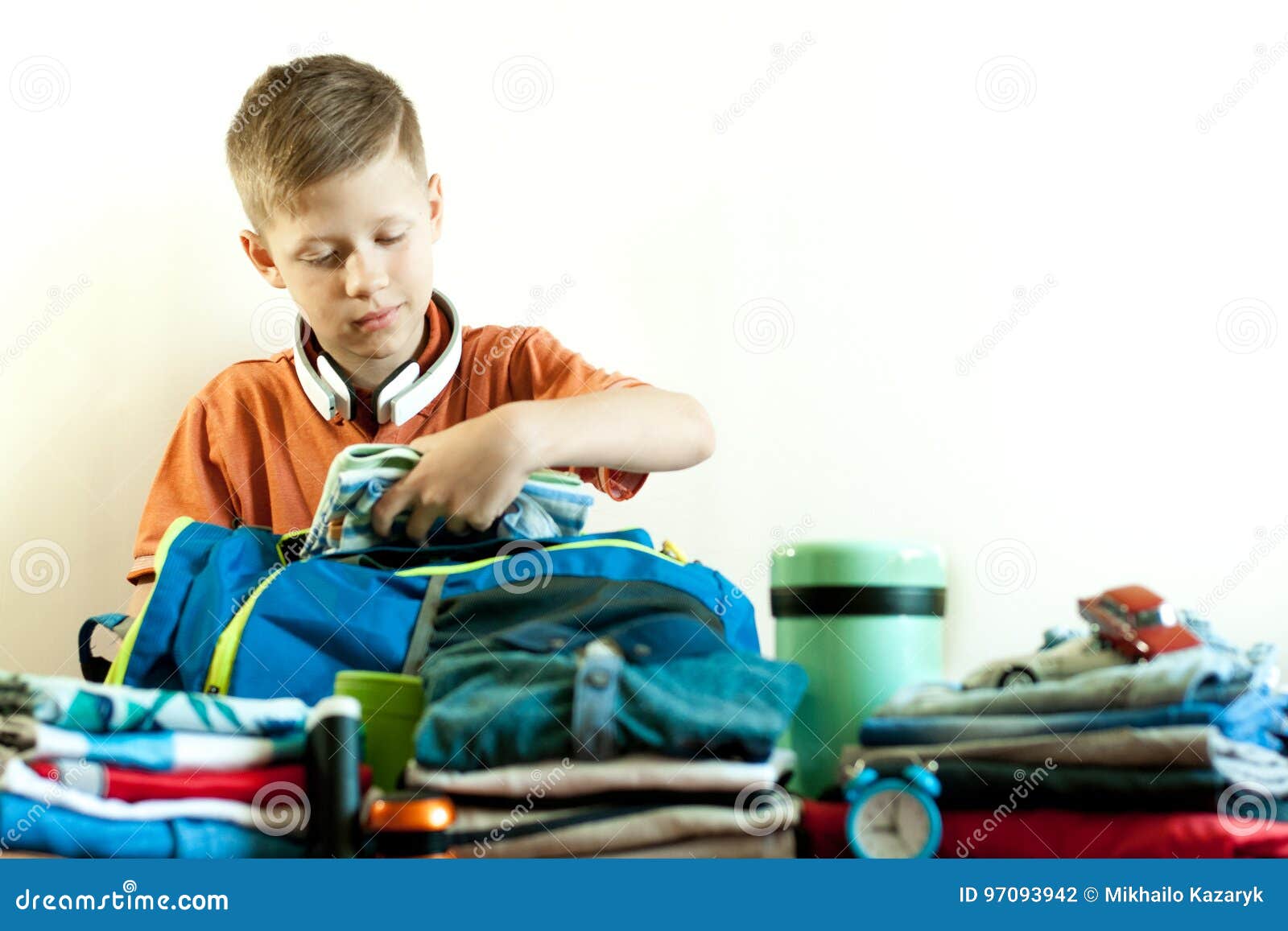 The Boy Collects His Things on the Trip Stock Photo - Image of colors ...