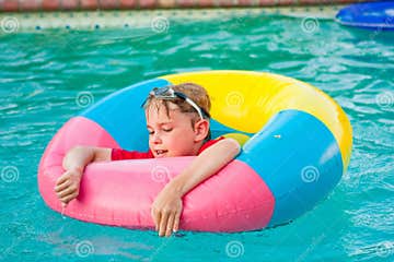 Boy in Colorful Float Ring in Swimming Pool Stock Image - Image of ...