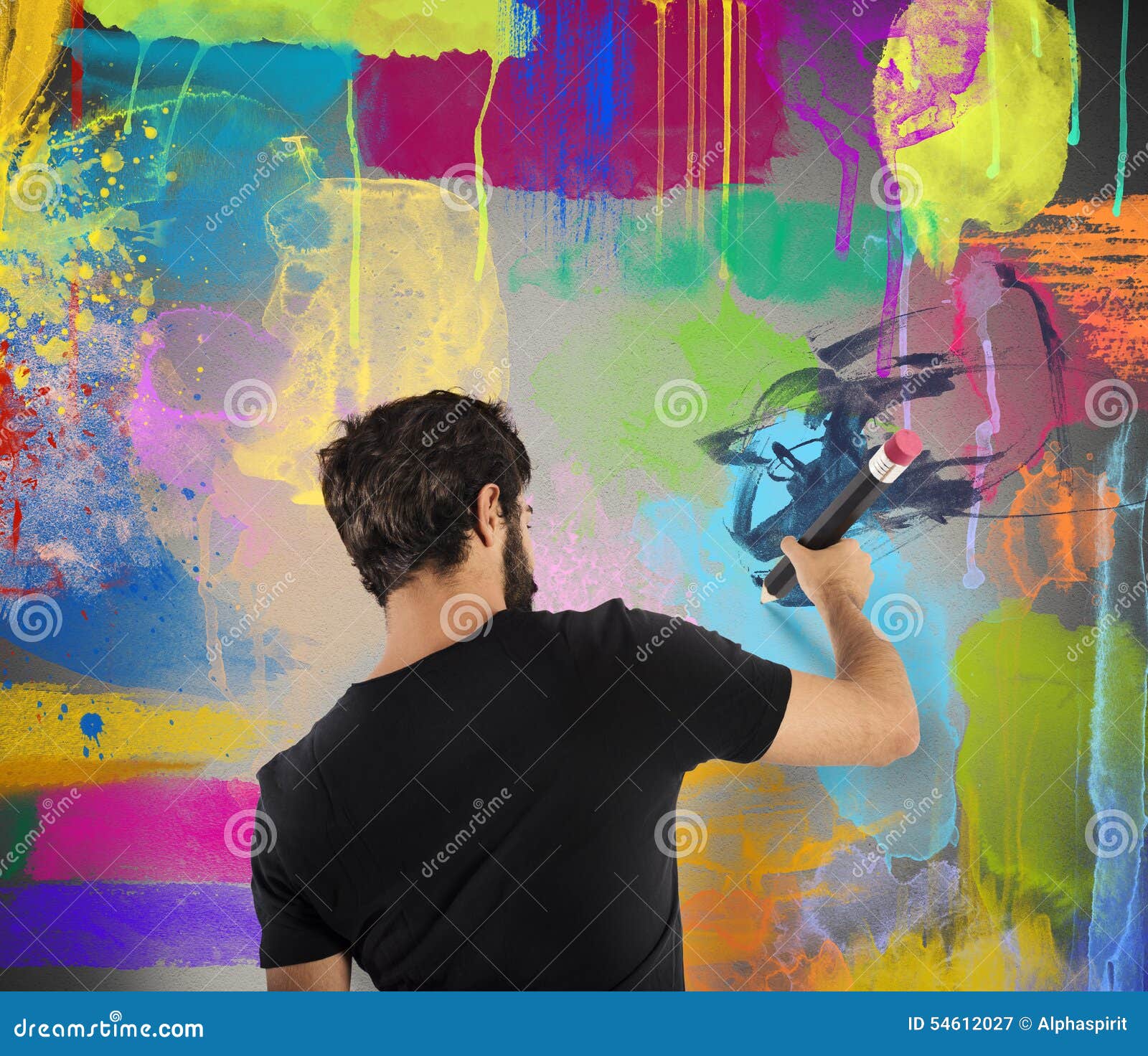 Boy colors a wall stock image. Image of color, creativity - 54612027