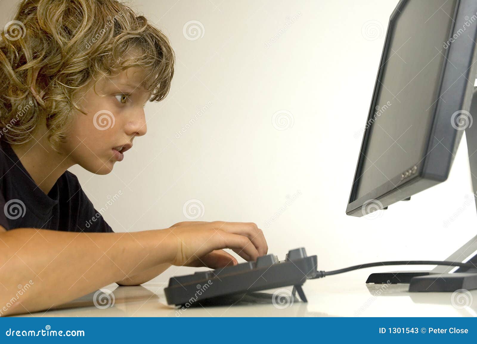 Boy at computer stock image. Image of keyboard, consult - 1301543