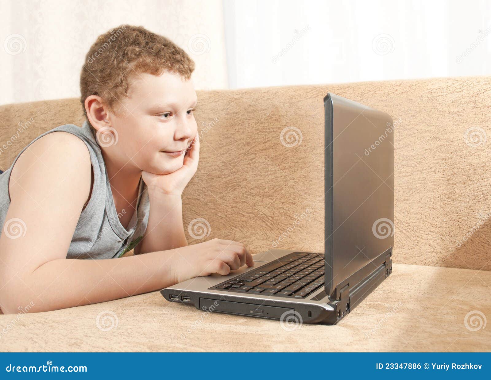 A boy with a computer stock photo. Image of child, laptop - 23347886