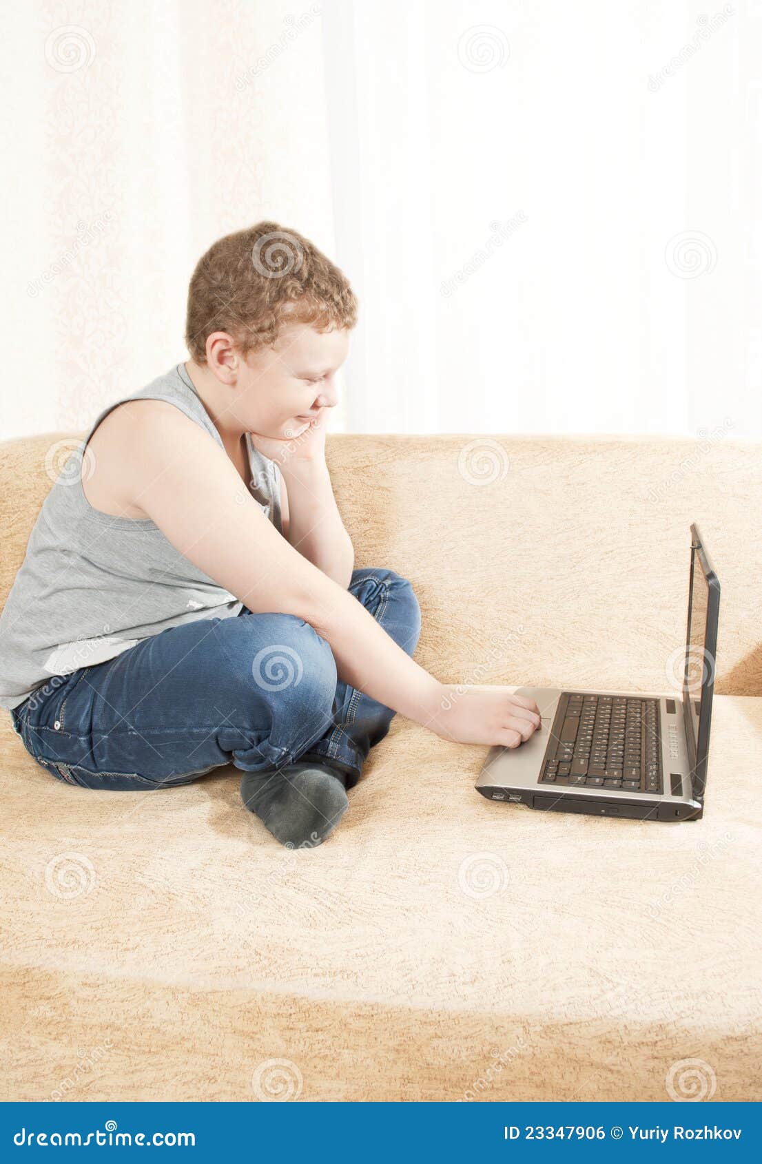 A boy with a computer stock photo. Image of child, screen - 23347906