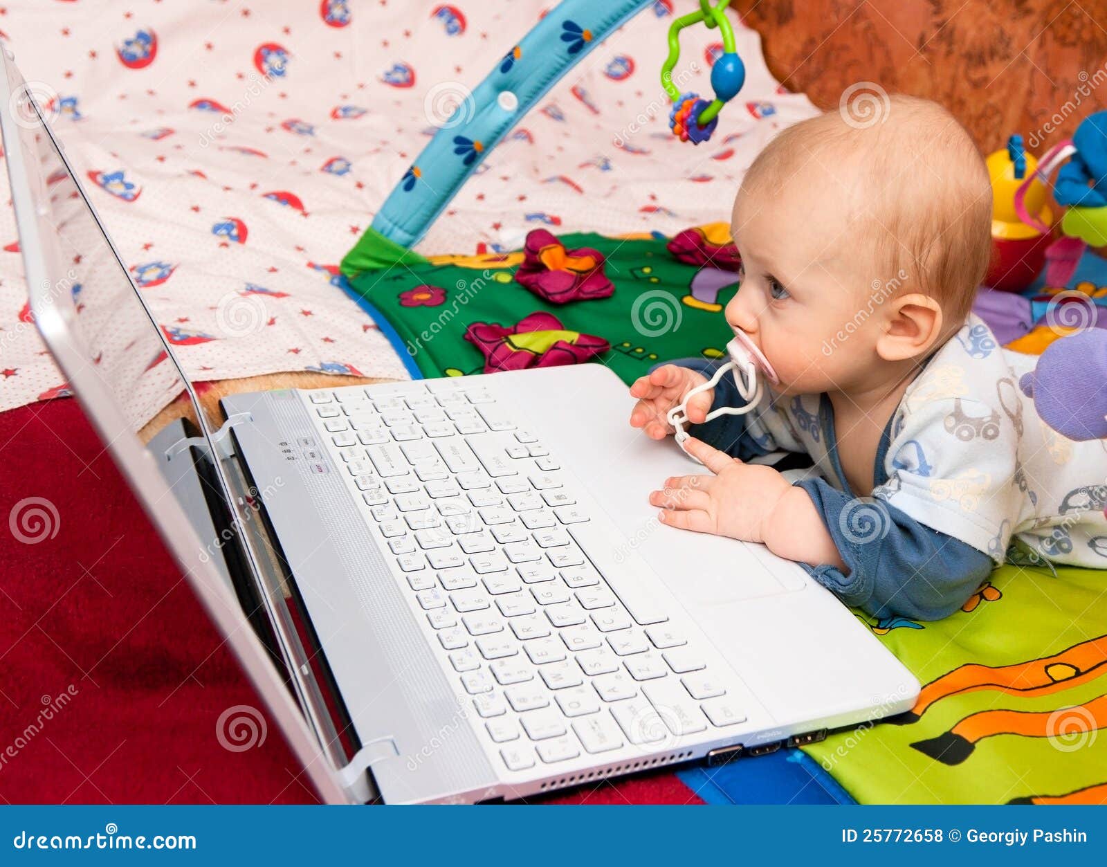 Boy and computer stock photo. Image of childhood, family - 25772658