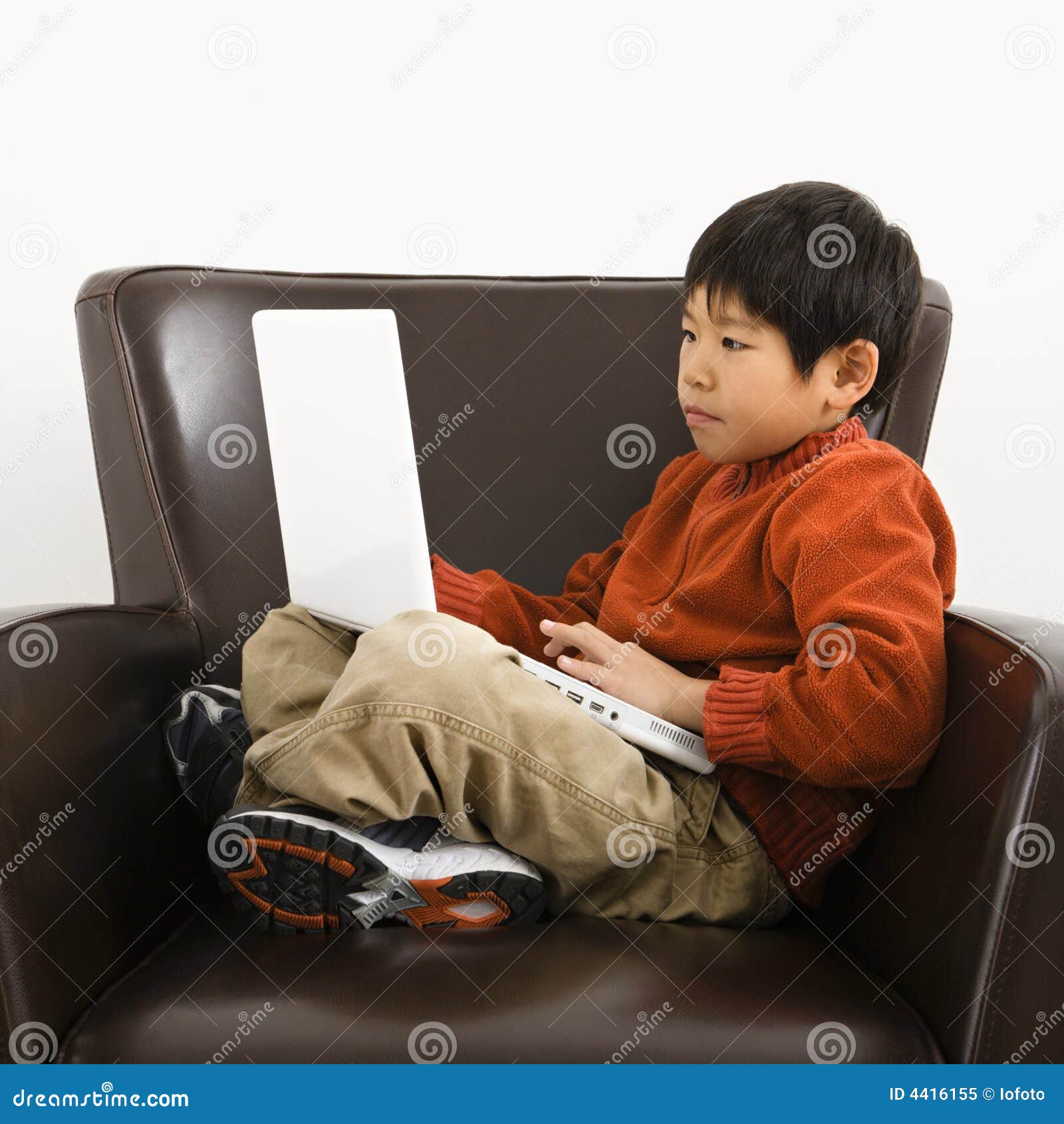 Boy with computer stock image. Image of cute, person, home - 4416155