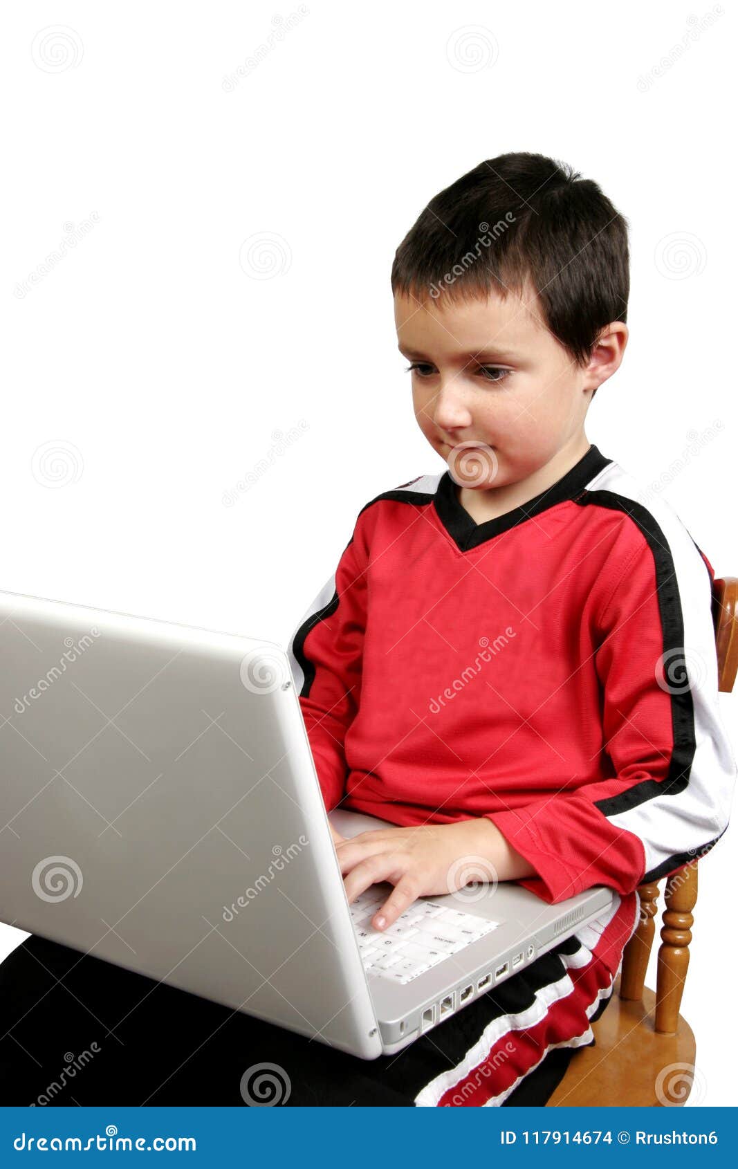 Boy with Computer stock photo. Image of concentration - 117914674