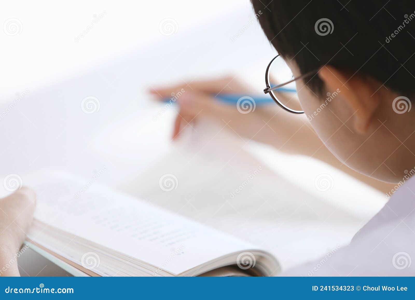 Boy Concentrating on Books, Reading and Studying Stock Image - Image of ...