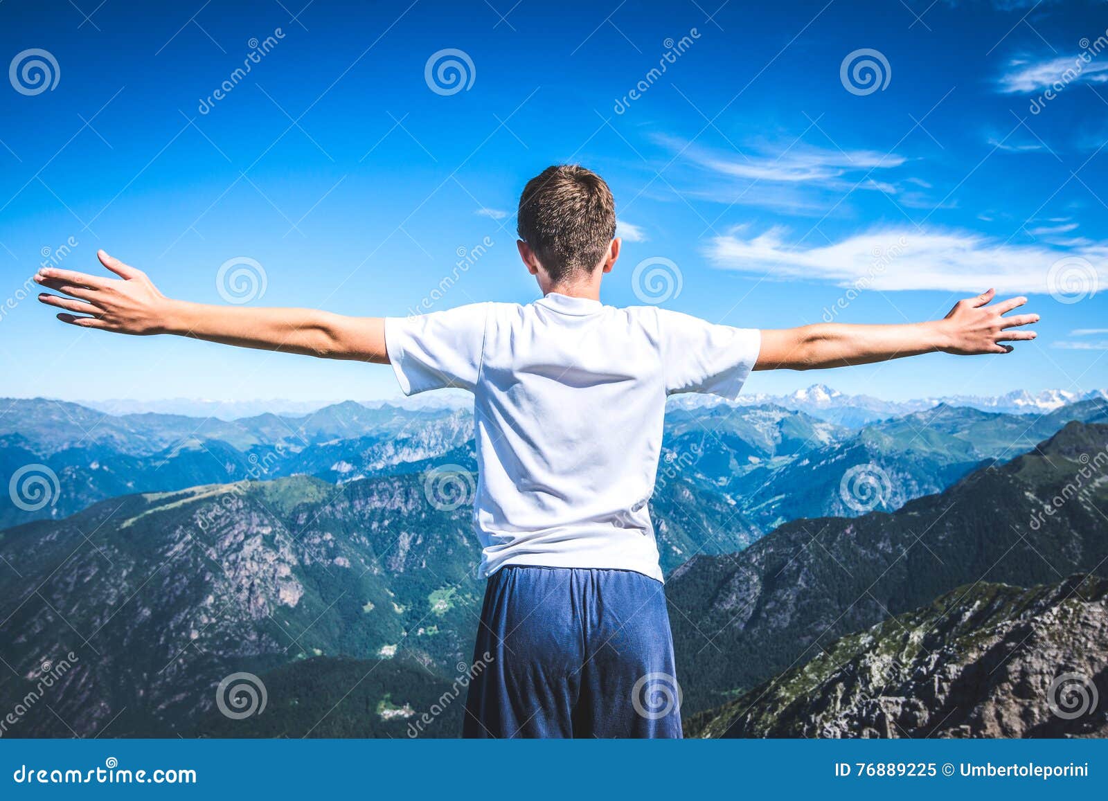 Boy contemplate the view stock image. Image of mountain - 76889225