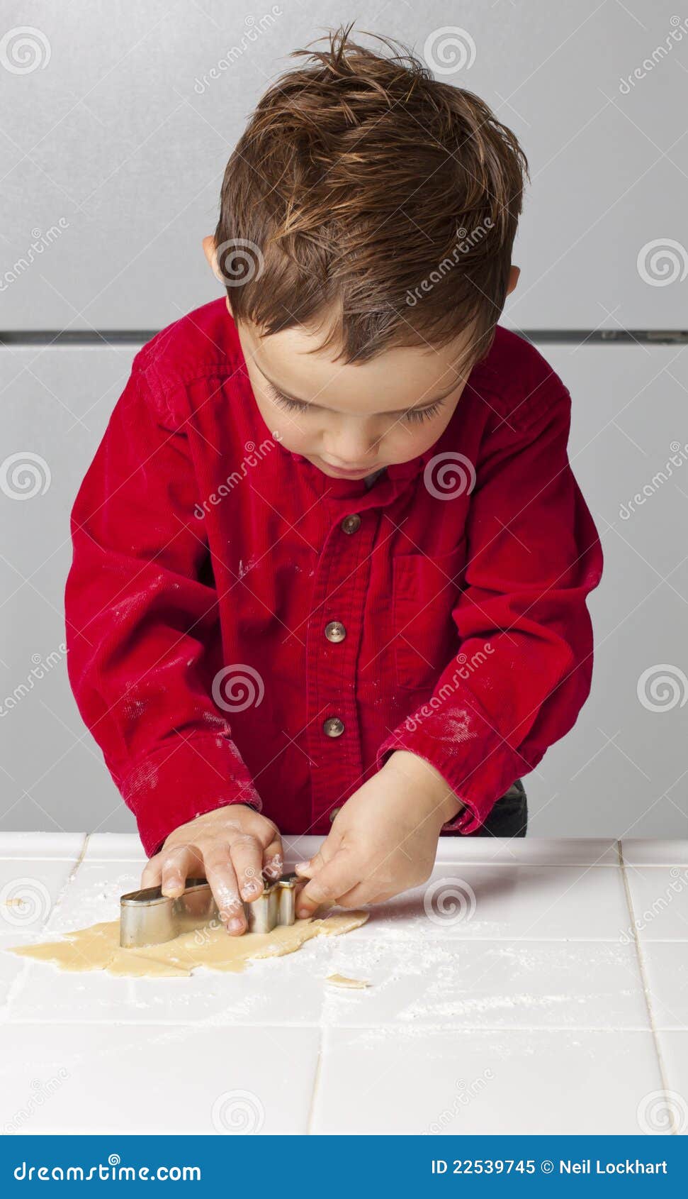 Boy with Cookie Cutter stock image. Image of children - 22539745