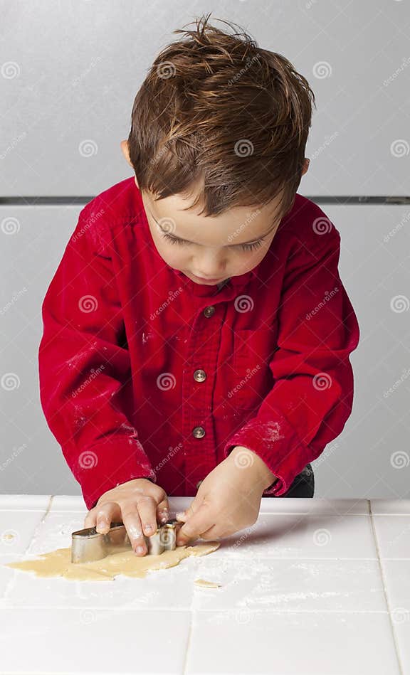 Boy with Cookie Cutter stock image. Image of children - 22539745