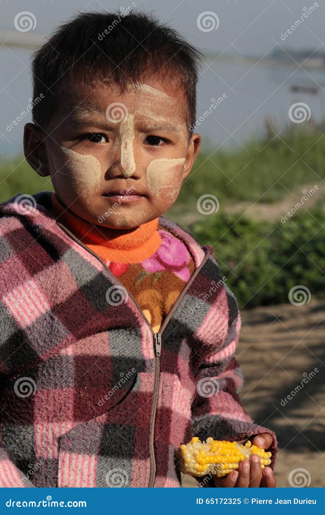 Boy with the corn editorial image. Image of world, child - 65172325