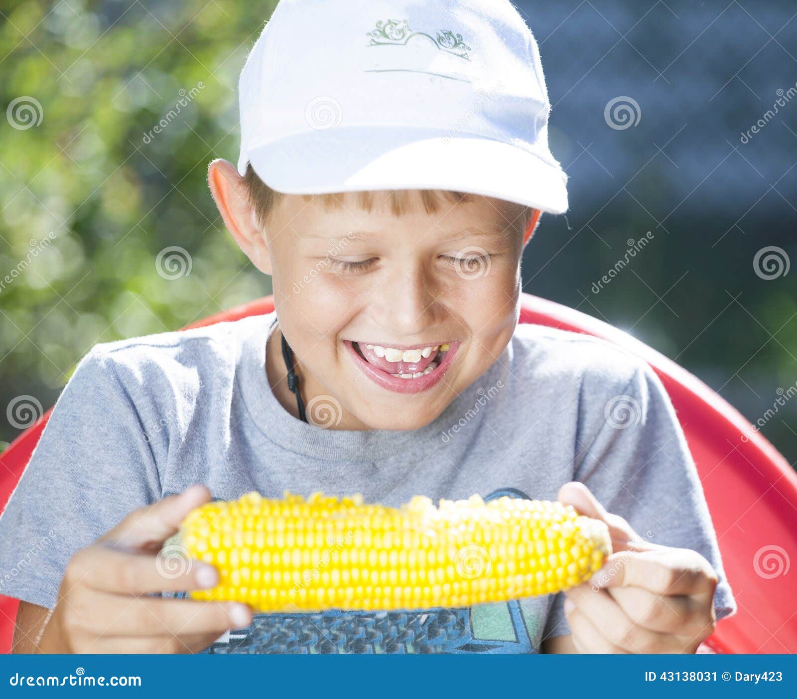 Boy with corn stock image. Image of locations, person - 43138031