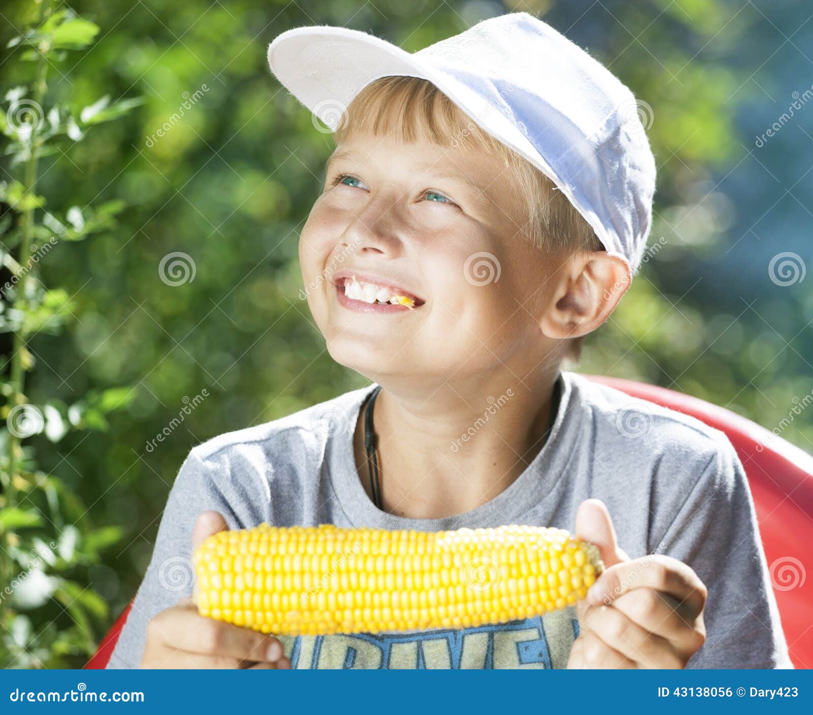 Boy with corn stock photo. Image of humor, boys, bite - 43138056