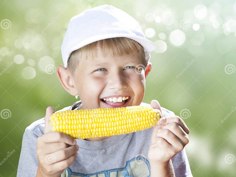 Boy with corn stock photo. Image of locations, person - 43146340