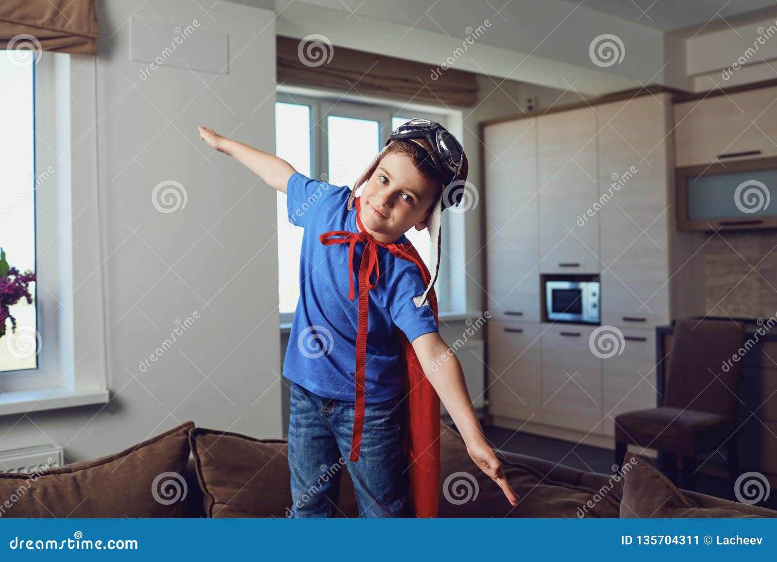 The Boy in the Costume of a Superhero at the Window Stock Image - Image ...