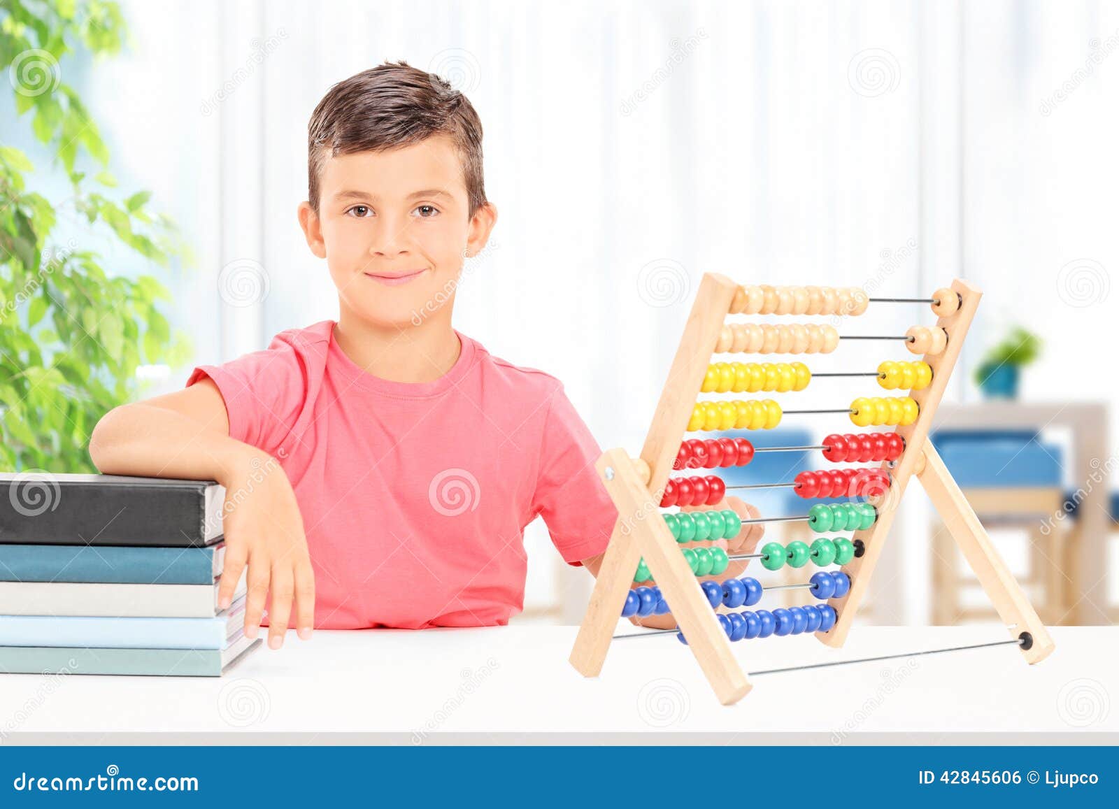 Boy Counting on an Abacus at Home Stock Photo - Image of junior ...