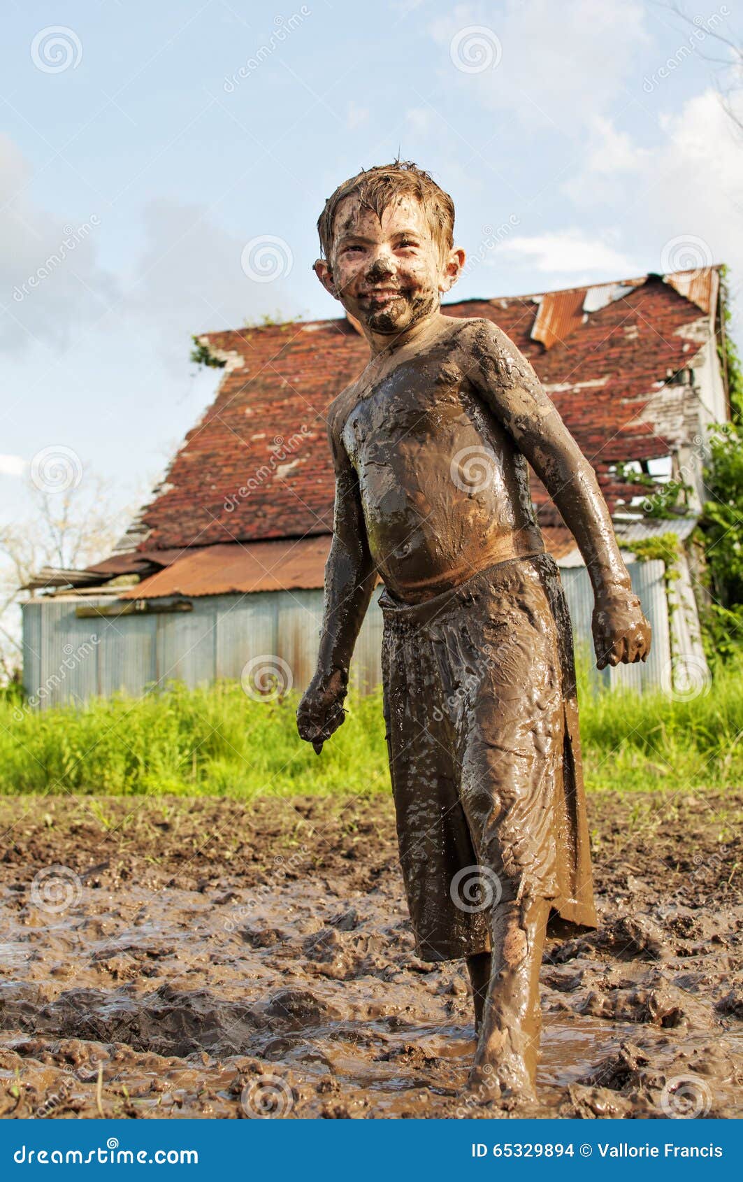 Boy covered in mud stock photo. Image of farm, mire, barn - 65329894