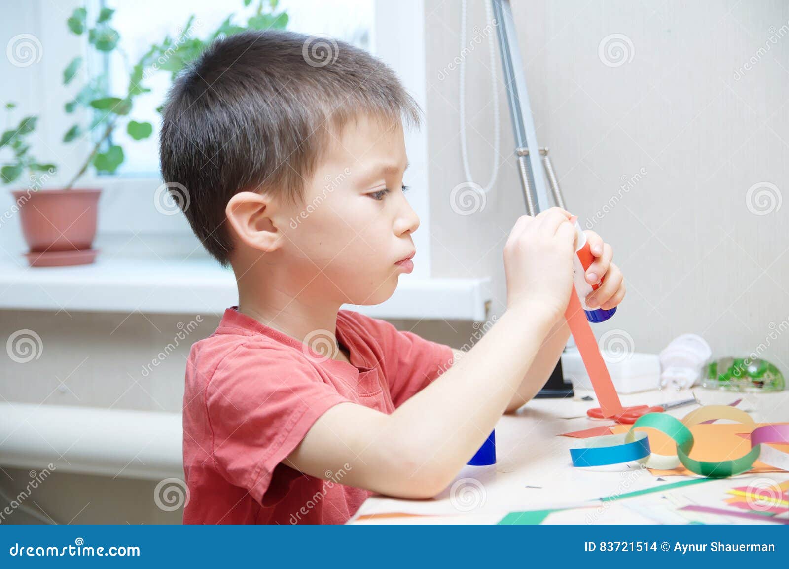 Boy Crafting with Paper Sitting on Table, Early Brain Developing Stock ...