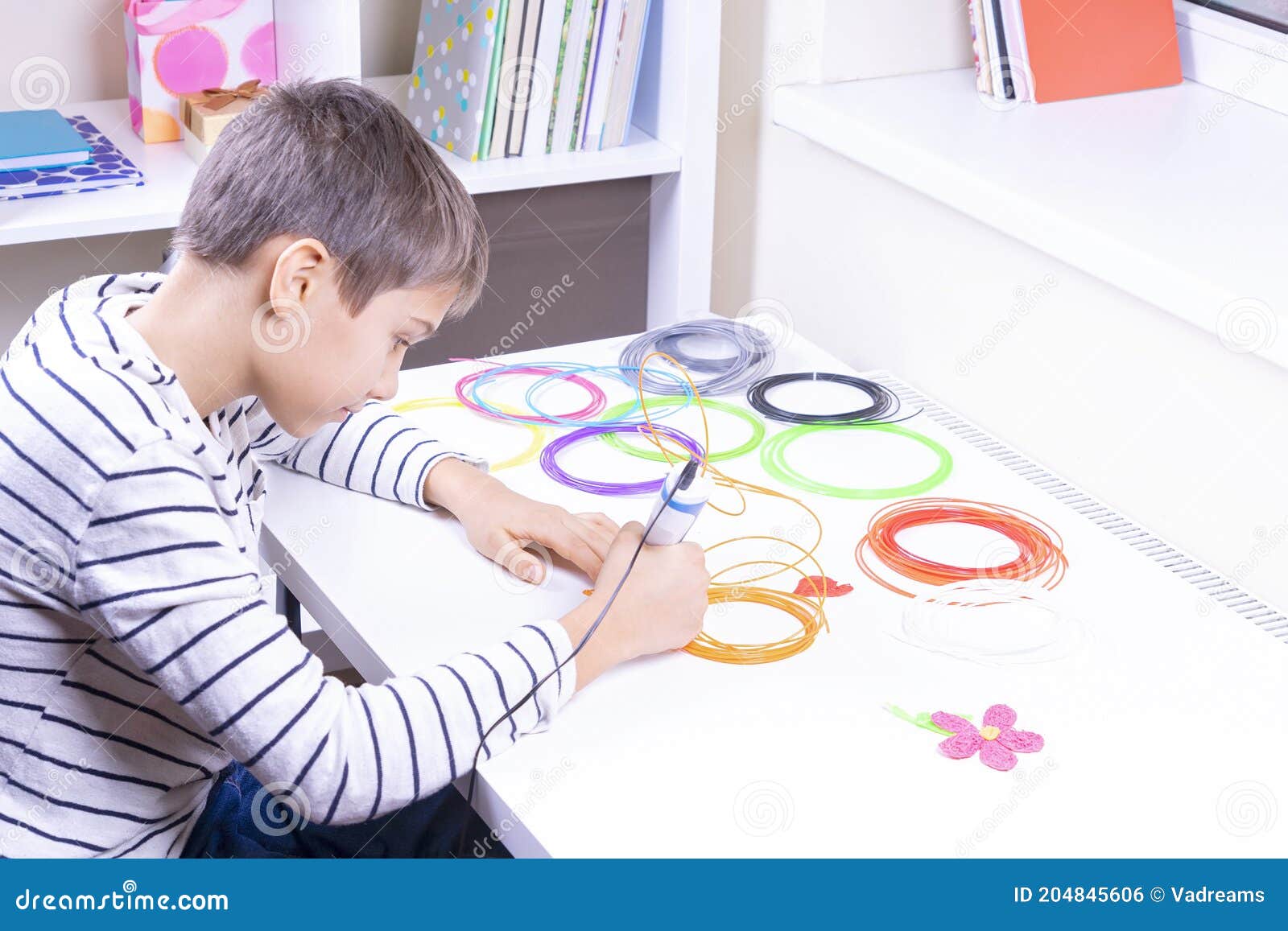 Boy Creating New 3d Object with 3d Pen. Learning and Entertainment at ...