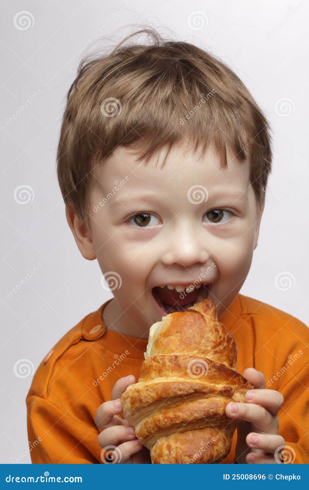 Boy with croissant stock photo. Image of children, drink - 25008696