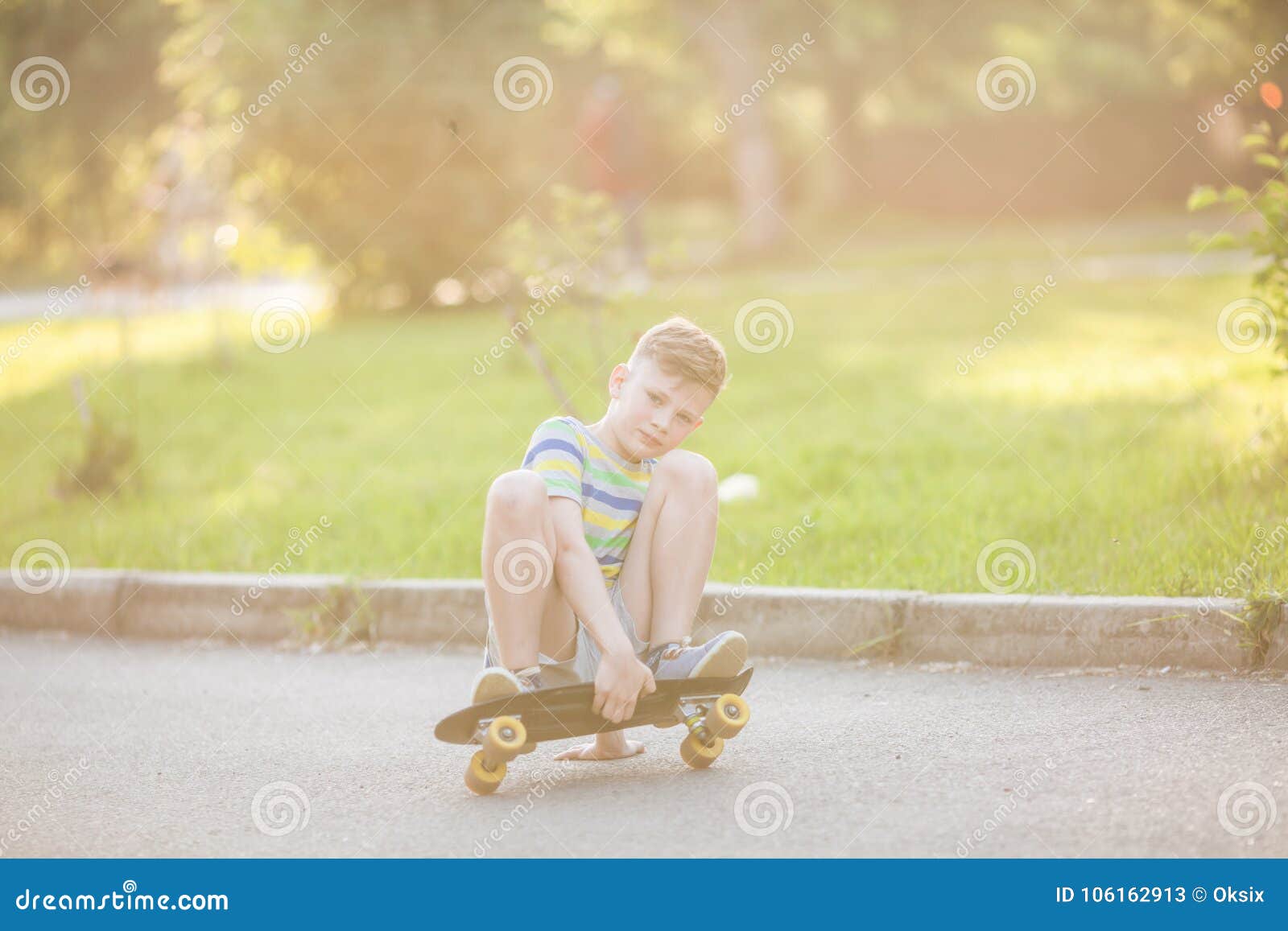 Boy riding a skateboard stock image. Image of park, people - 106162913
