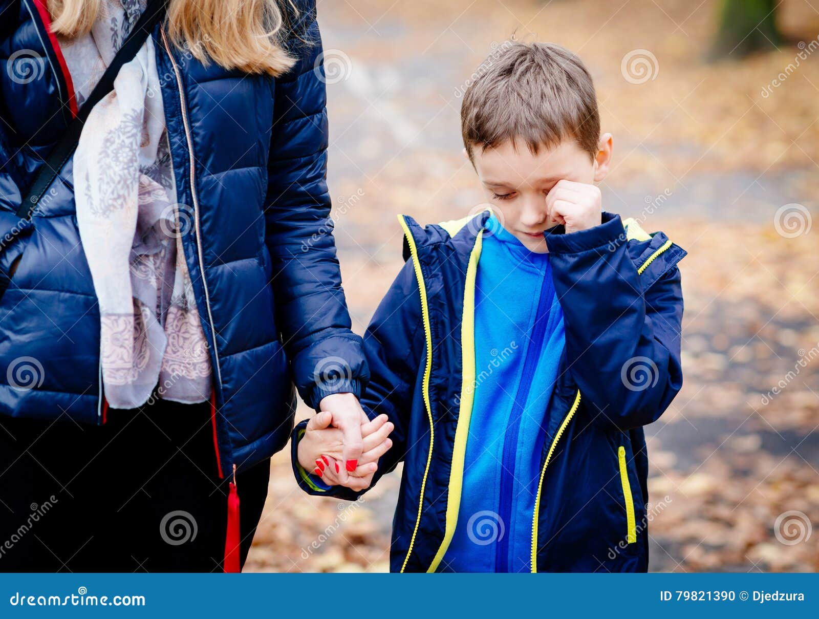 Boy Crying And Holding His Mother Hand During The Walk Stock Photo ...