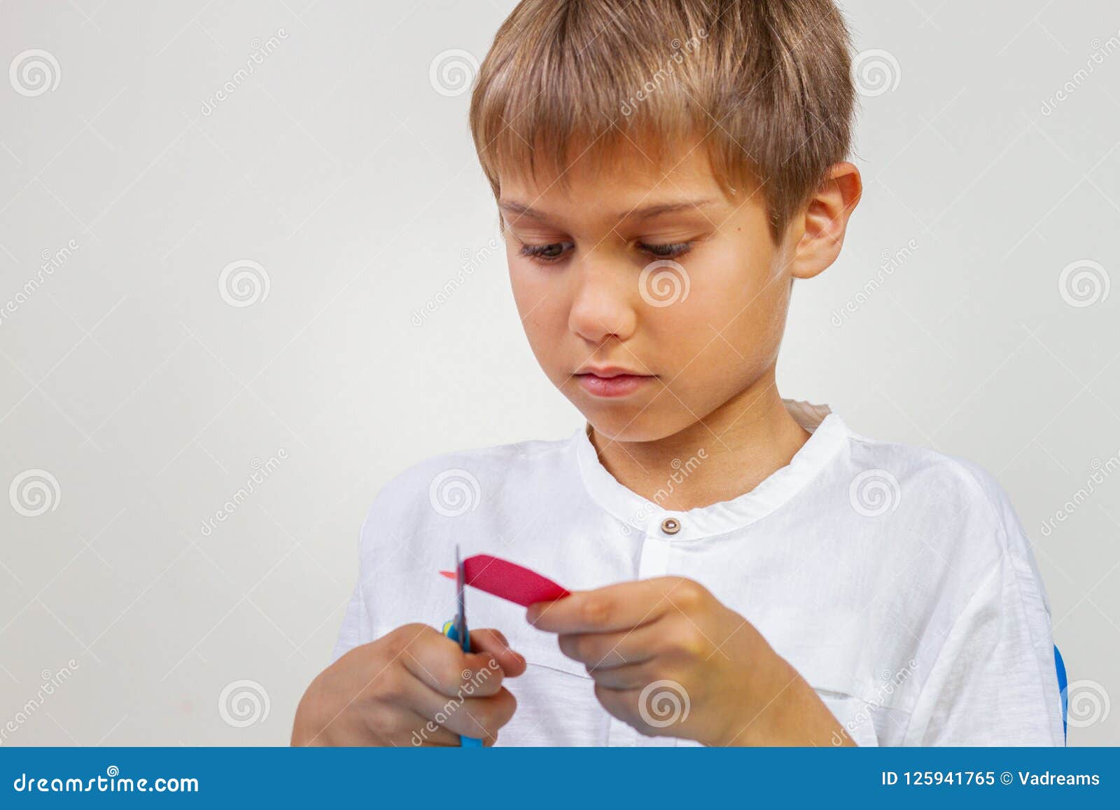 Child Cutting Colored Paper with Scissors Stock Image - Image of ...