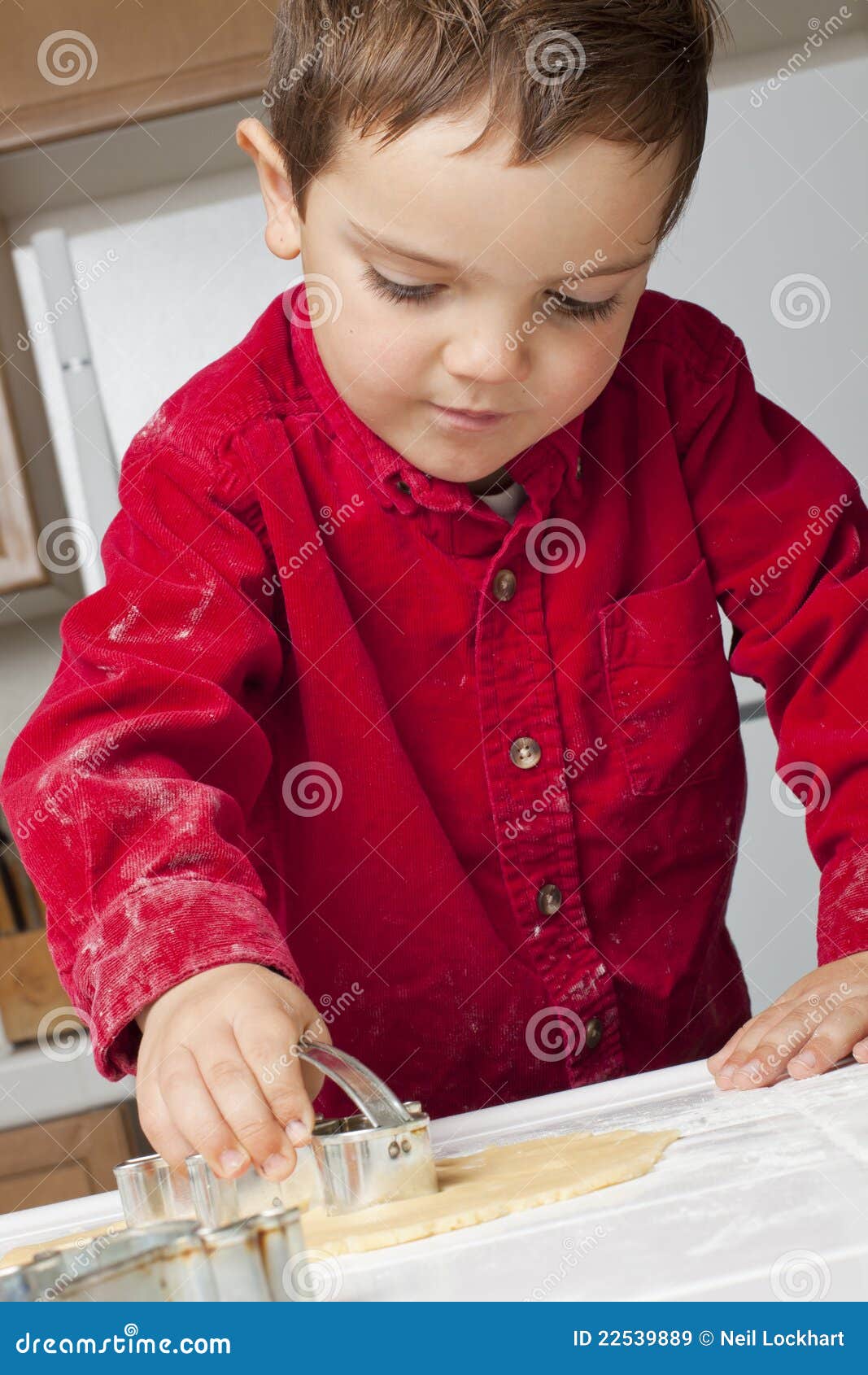 Boy Cutting Cookie Dough stock image. Image of flour - 22539889 Boy Cutting Cookie Dough stock image. Image of flour - 22539889