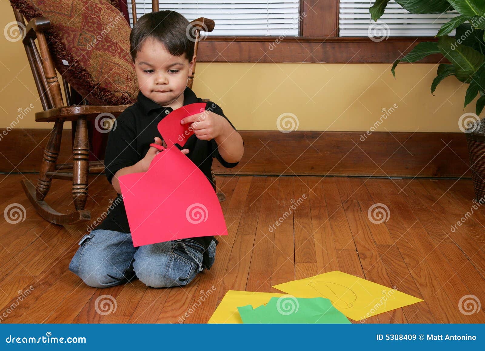 Boy cutting up paper stock image. Image of cutting, male - 5308409