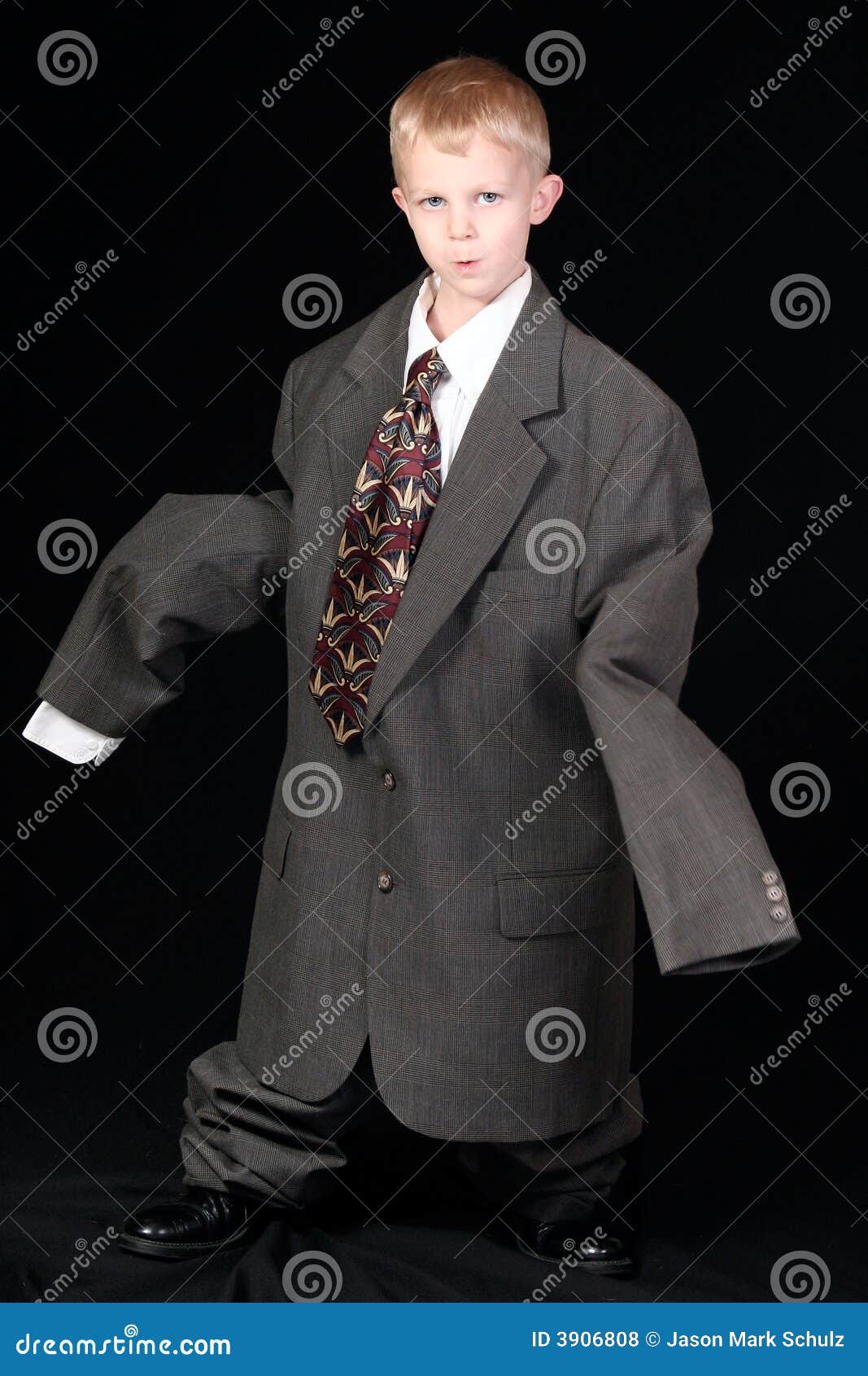 Boy in Dad s Business Suit stock photo. Image of career - 3906808