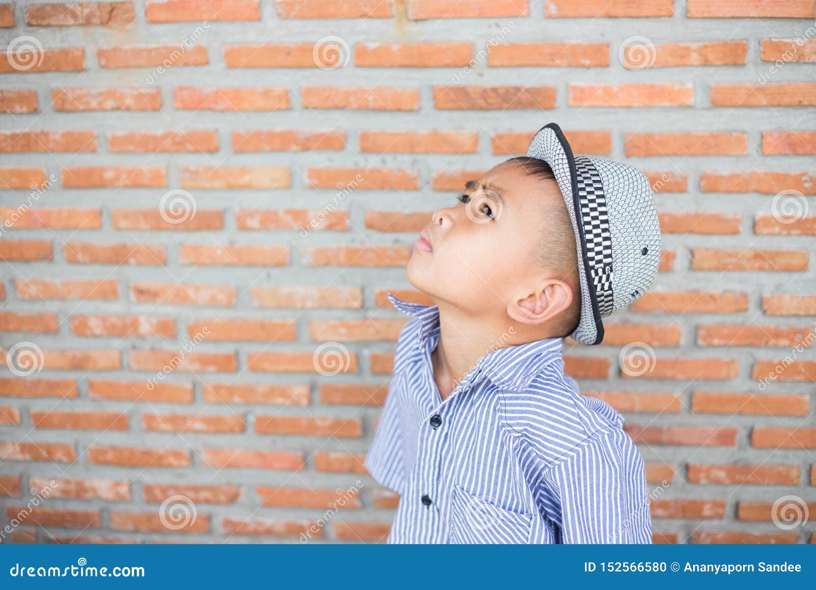 Boy deep in thought stock photo. Image of offspring - 152566580