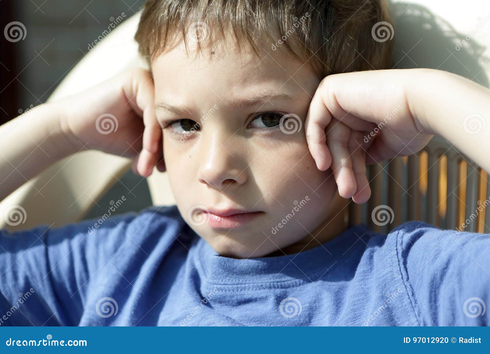 Boy with a determined look stock photo. Image of determination - 97012920