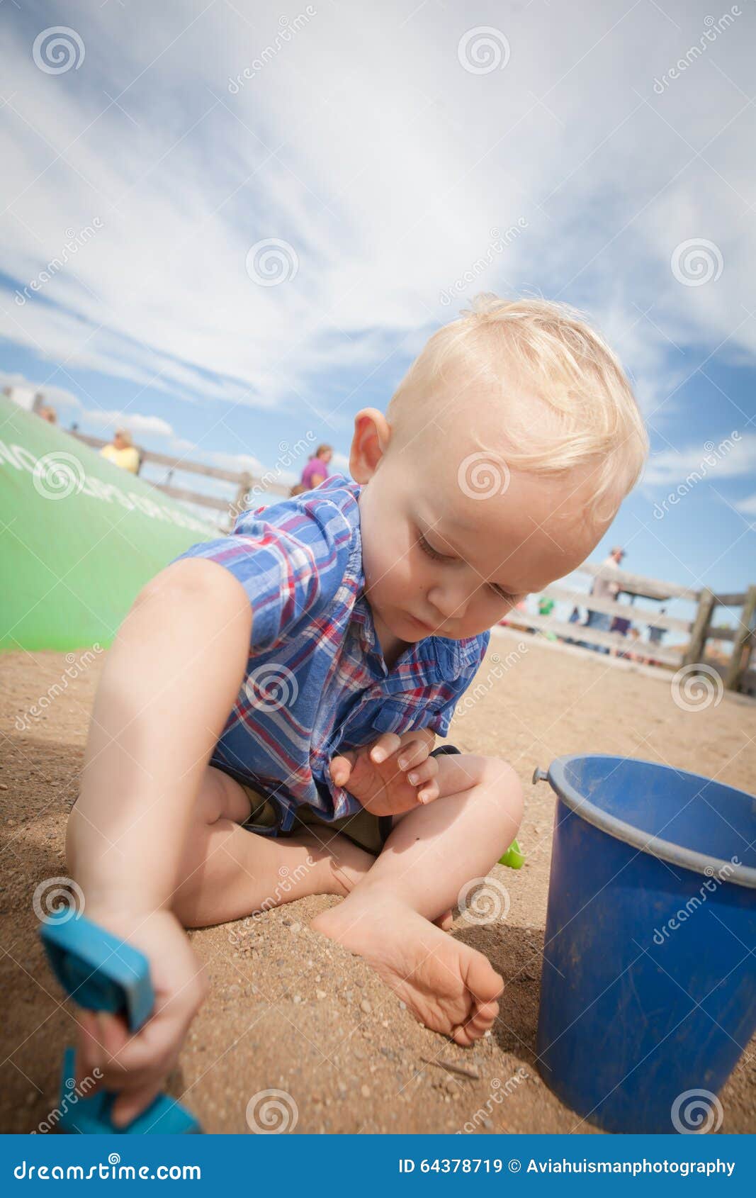 Boy Digging in Dirt stock image. Image of playful, bucket - 64378719