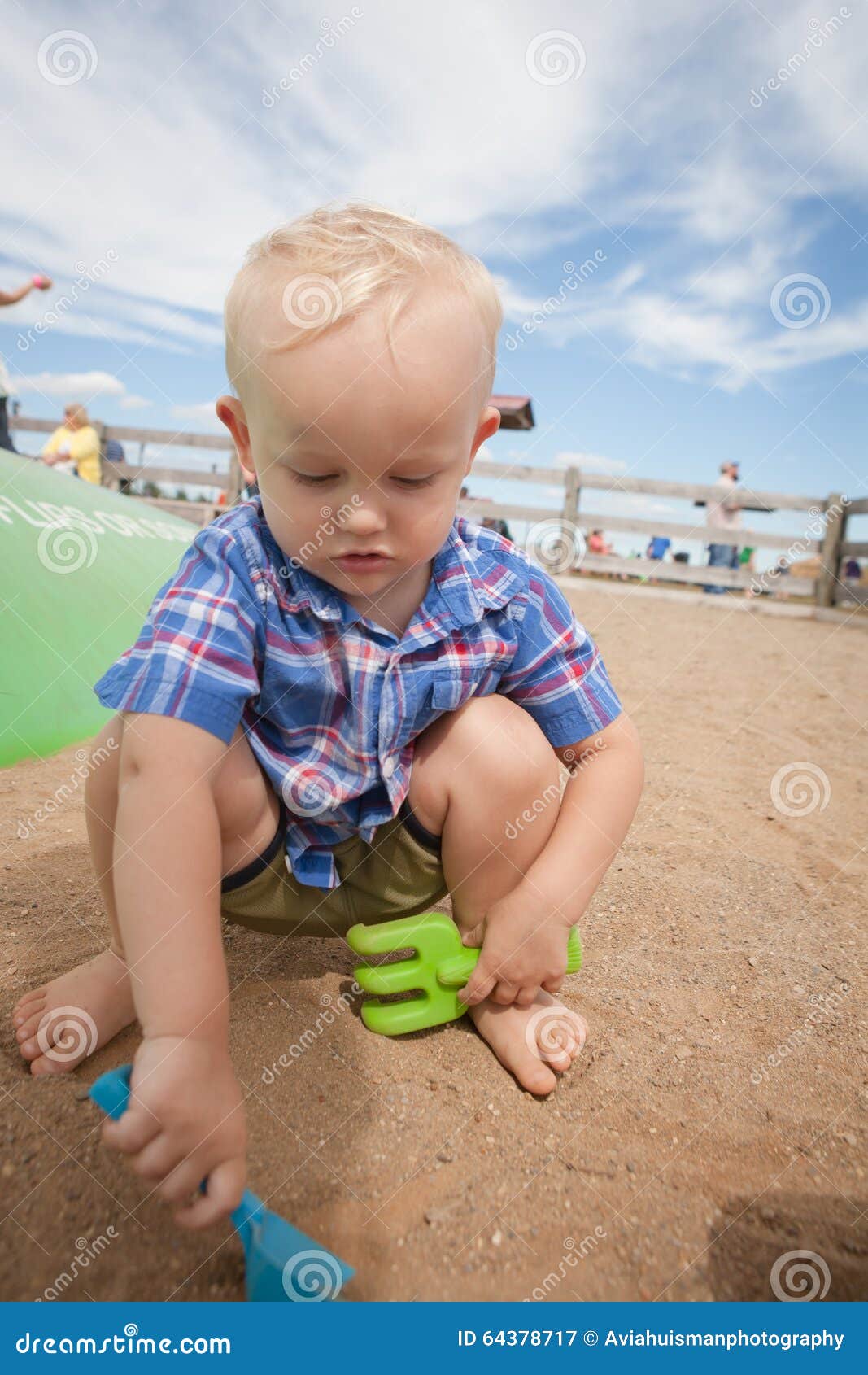 Boy Digging in Dirt stock image. Image of park, preschool - 64378717